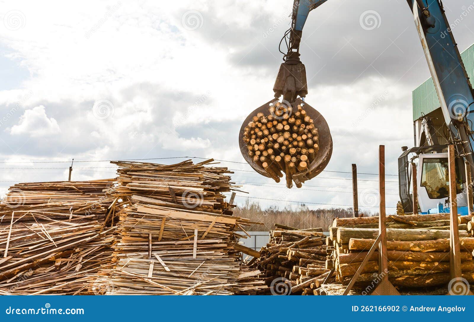 Log Loader or Forestry Machine Loads a Log Truck Stock Photo - Image of ...