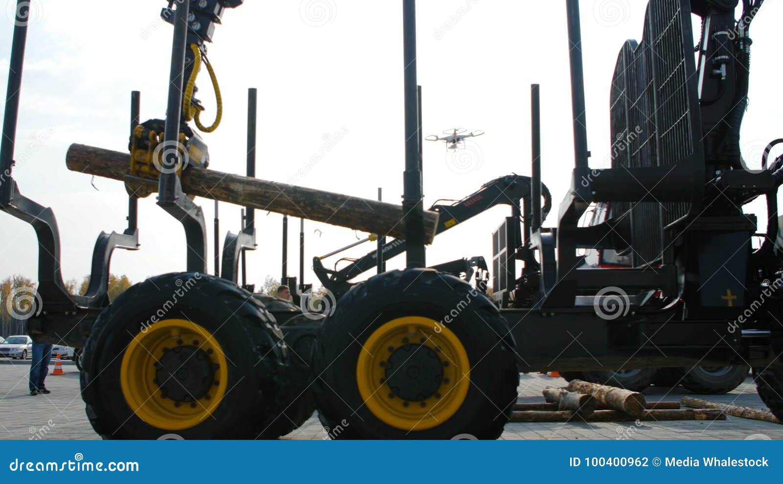 Log Loader or Forestry Machine Moves Fresh Cut Logs for Loading Stock ...