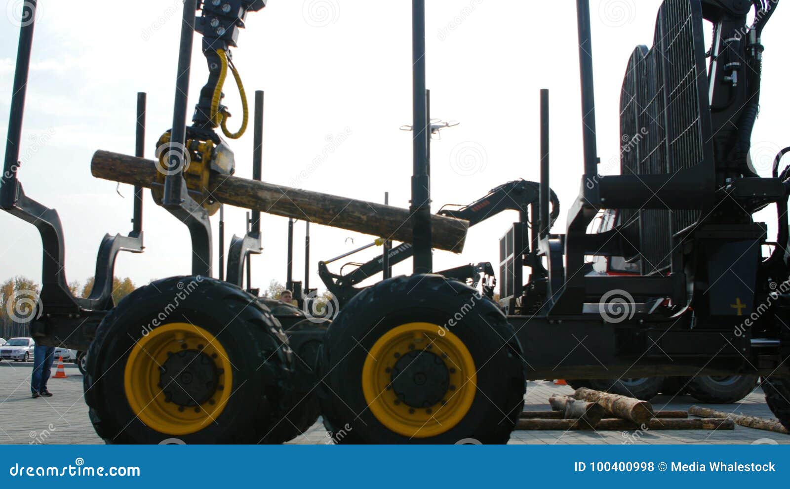 Log Loader or Forestry Machine Moves Fresh Cut Logs for Loading ...