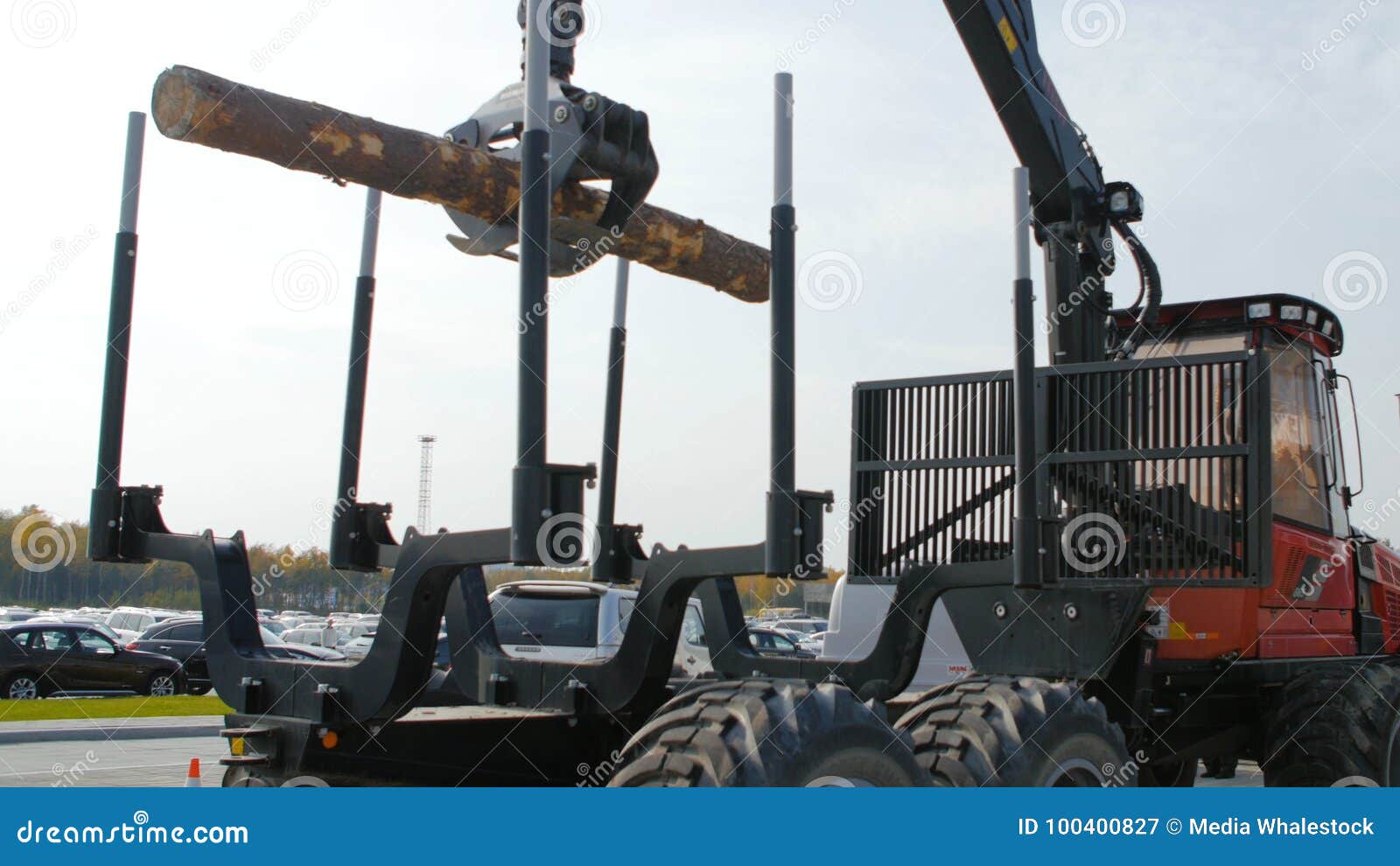 Log Loader or Forestry Machine Moves Fresh Cut Logs for Loading ...