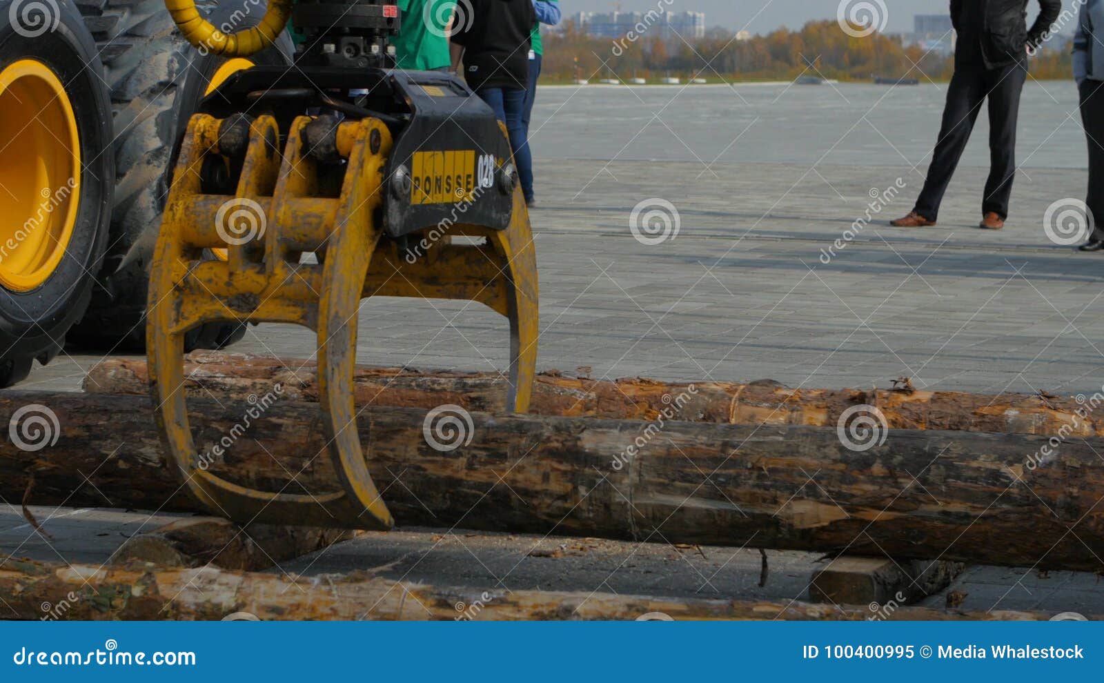 Log Loader or Forestry Machine Moves Fresh Cut Logs for Loading ...