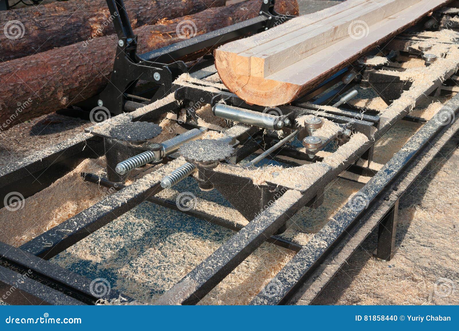 Log in sawmill equipment stock photo. Image of line, forestry - 81858440