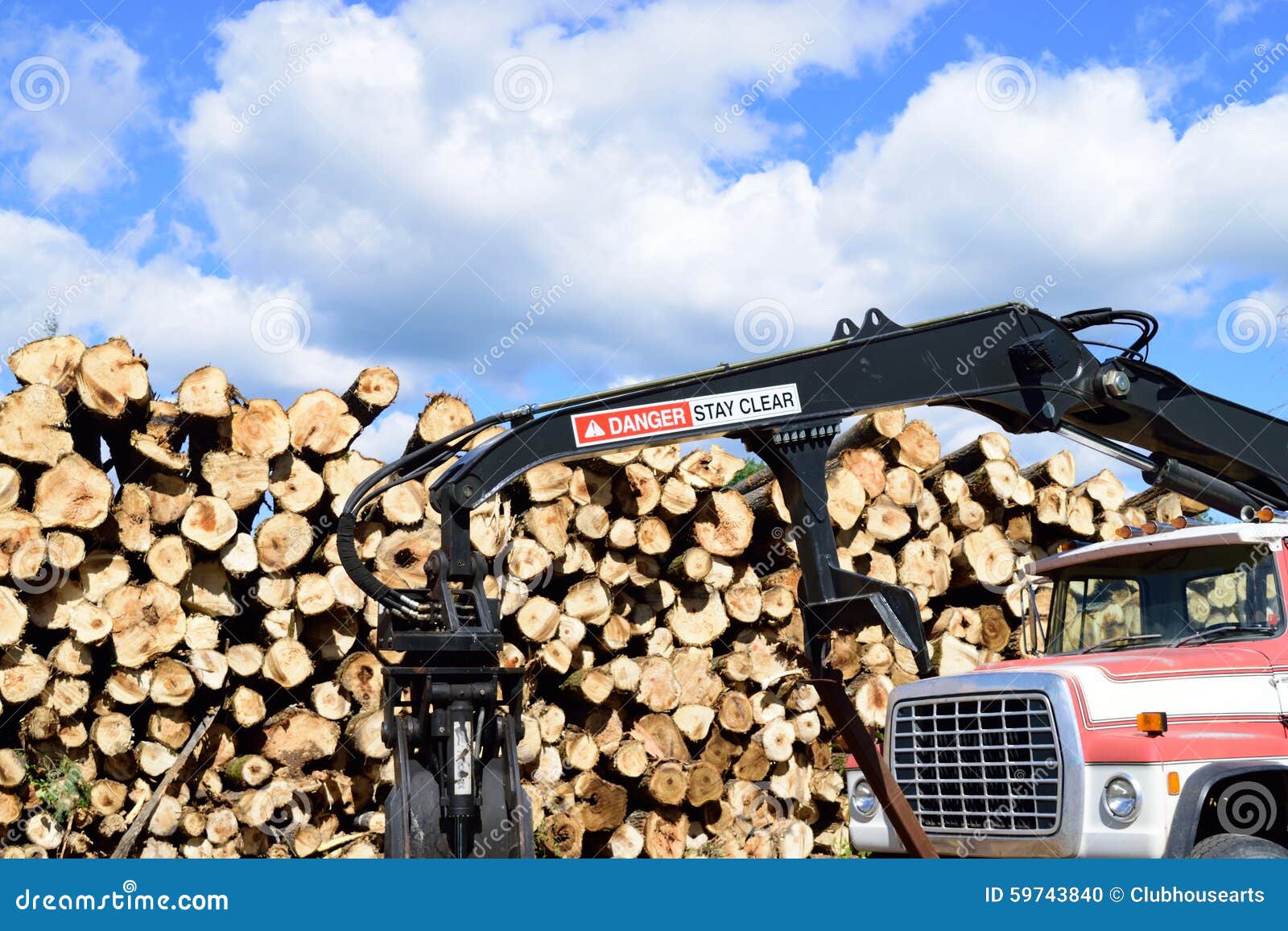 Log Truck with Loader in Front of Pulp Pile Stock Photo - Image of ...