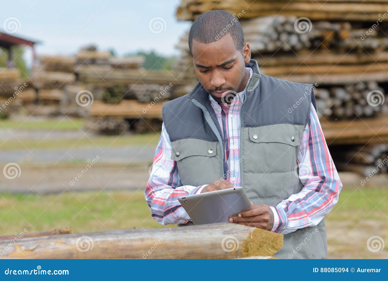 Log worker holding tab stock photo. Image of burning - 88085094