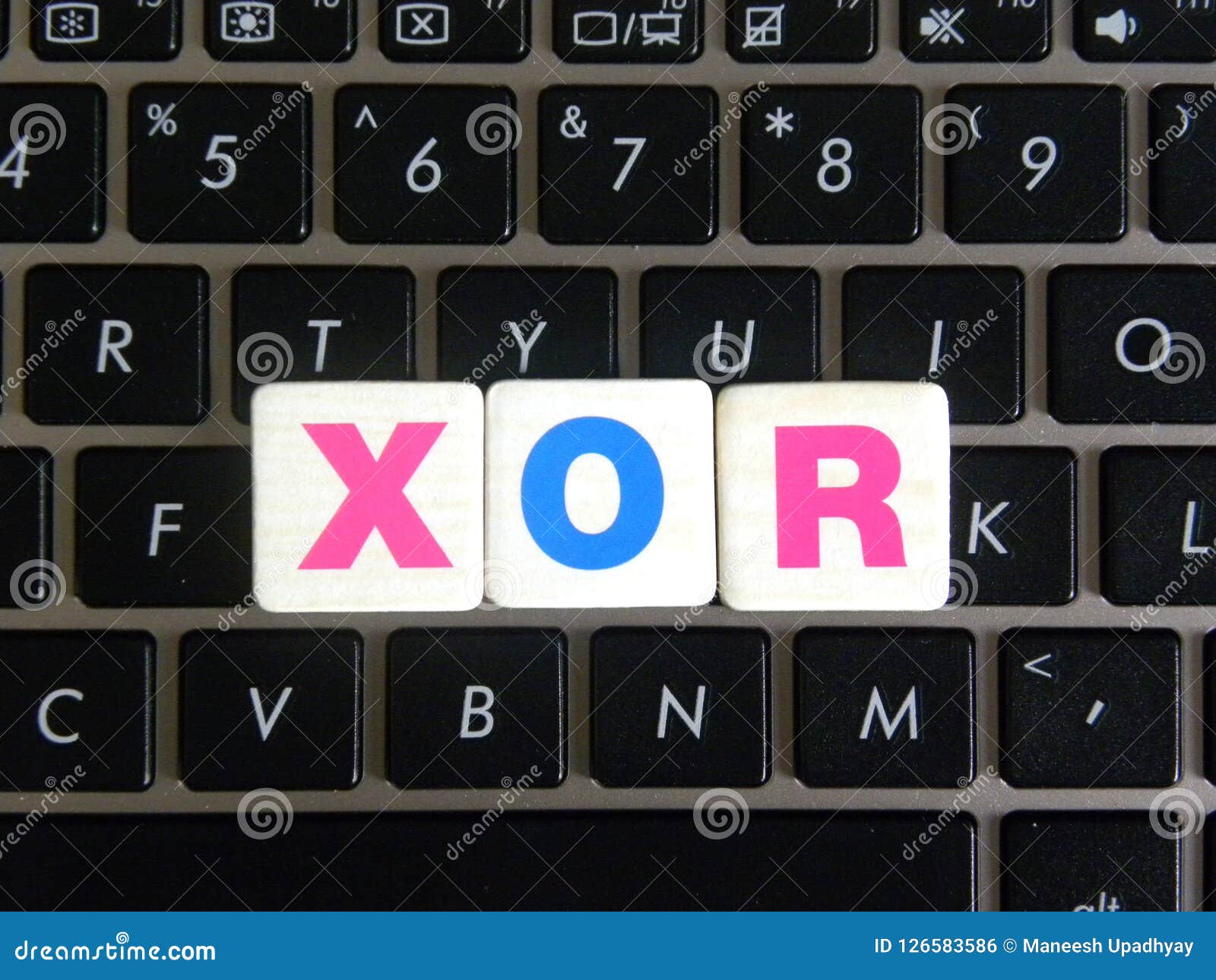 Word XOR on Keyboard Background Stock Photo - Image of font, background ...