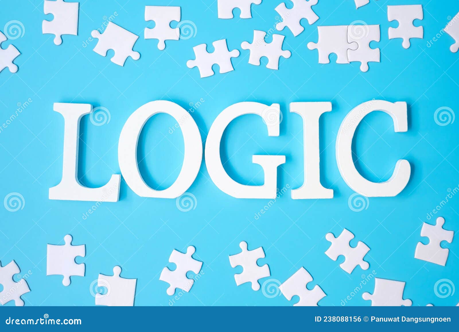 LOGIC Text with White Puzzle Jigsaw Pieces on Blue Background. Concepts ...
