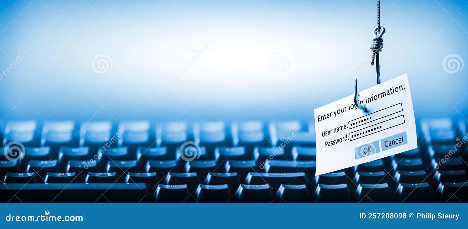 Login Information Attached To Large Hook Hanging in Front of Computer ...