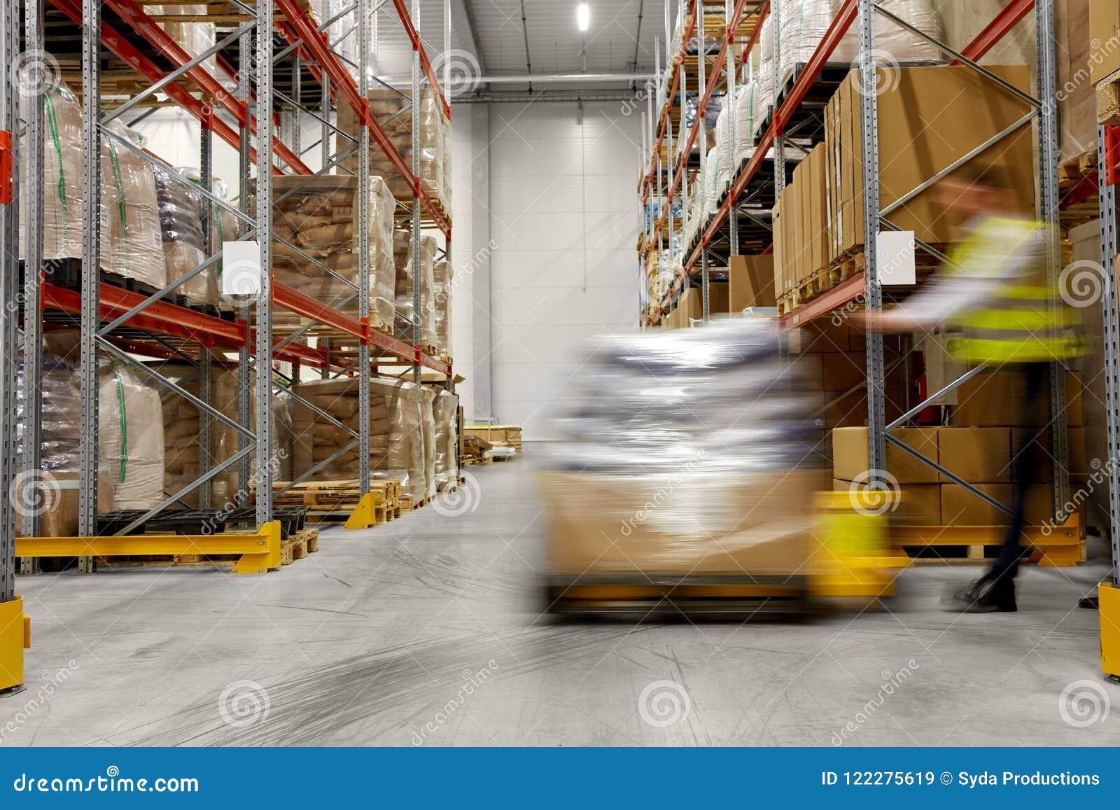 Worker Carrying Loader with Goods at Warehouse Stock Image - Image of ...