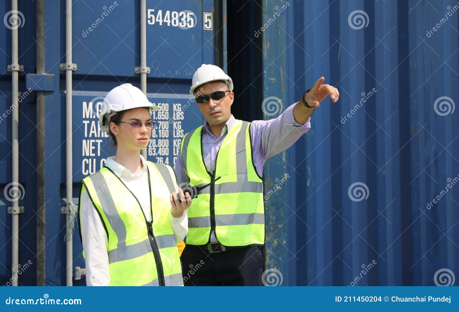 Logistics Engineer Control at the Port, Loading Containers for Trucks ...
