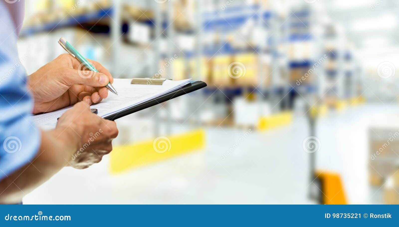 Logistics Service Man Writing Documents on Clipboard in Warehouse Stock ...