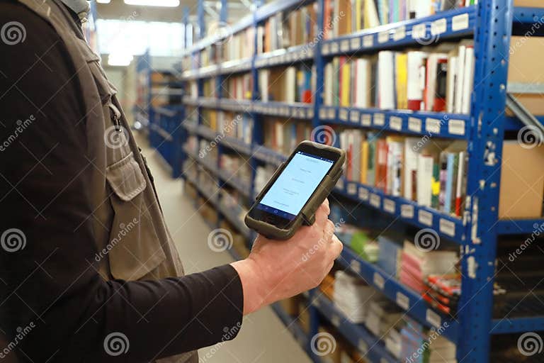 Logistics Warehouse -operator Holding a PDA Stock Photo - Image of ...