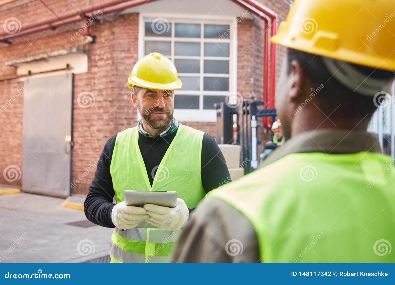Logistics Worker in Teamwork while Loading Stock Photo - Image of ...