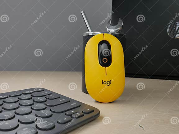 Logitech Pop Yellow mouse editorial stock image. Image of lighting ...