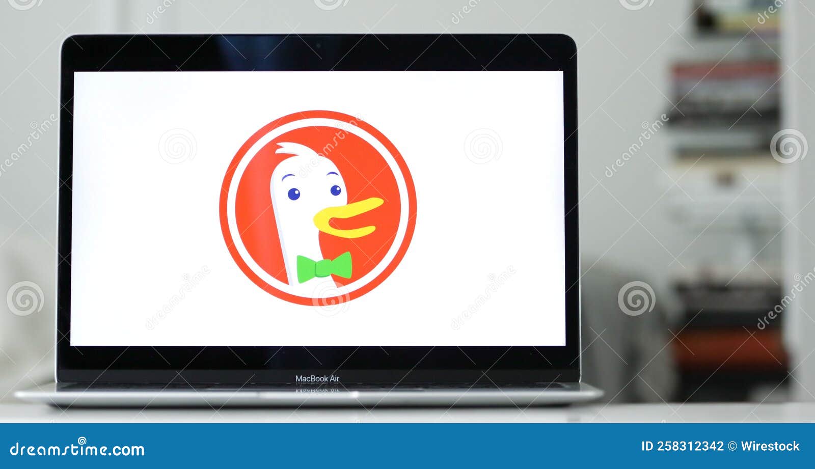 Logo Design of DuckDuckGo on a Laptop Screen in Blurred Background ...