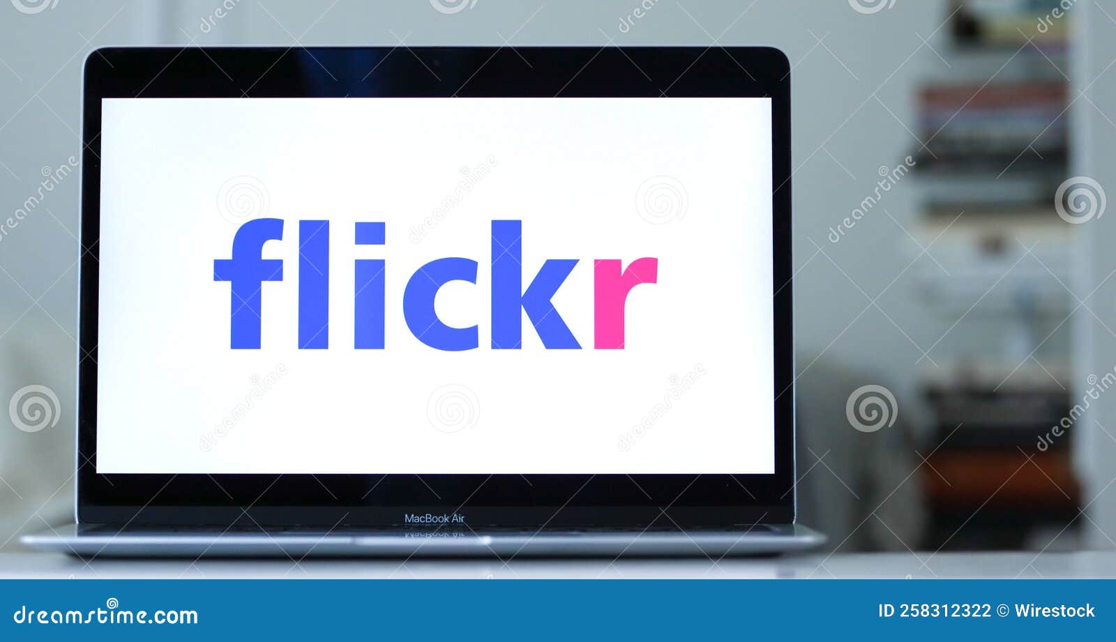 Logo Design of Flickr on a Laptop Screen in Blurred Background ...