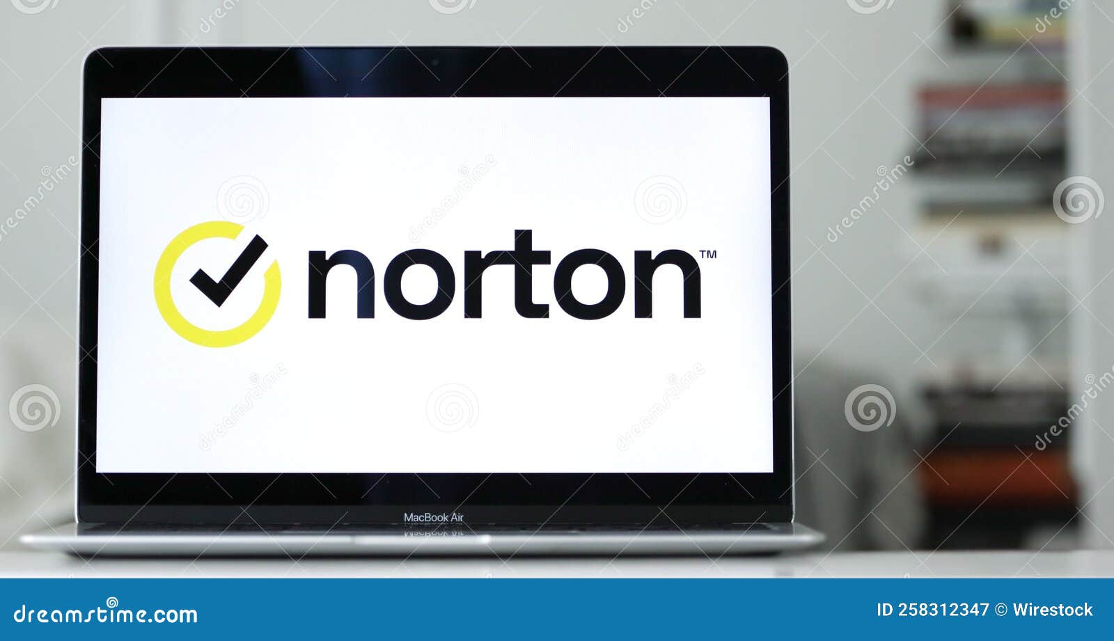 Logo Design of Norton on a Laptop Screen in Blurred Background ...
