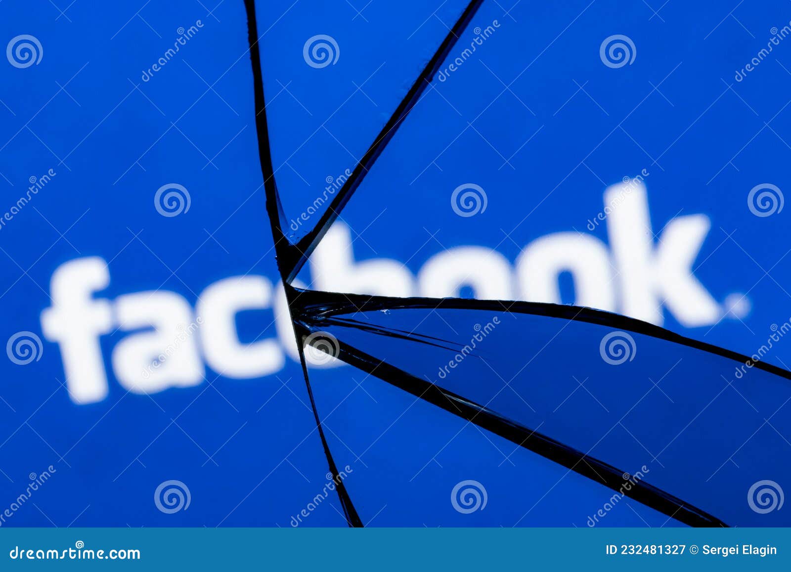 Logo of the Facebook Social Network in the Reflection of a Broken ...