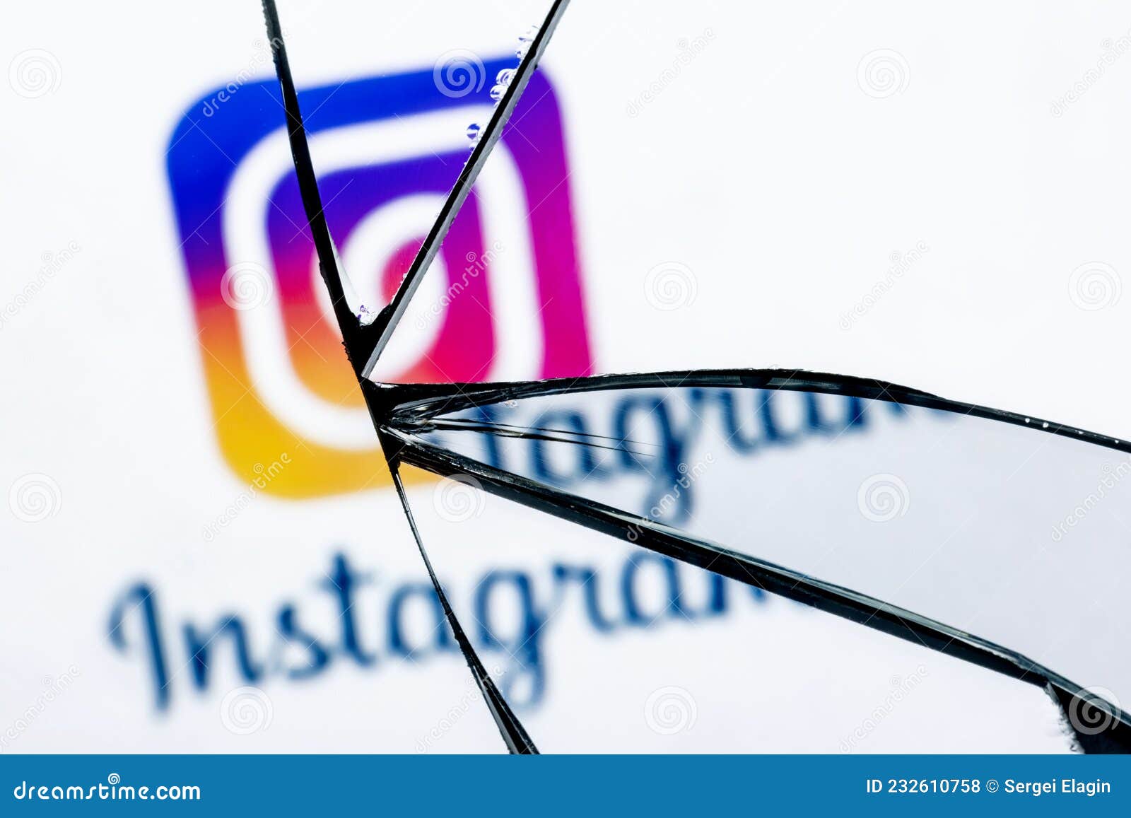 Logo of the Instagram Social Network in the Reflection of a Broken ...