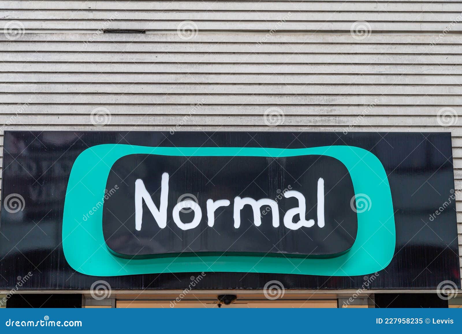 Normal Logo On A Wall Editorial Image | CartoonDealer.com #247297994