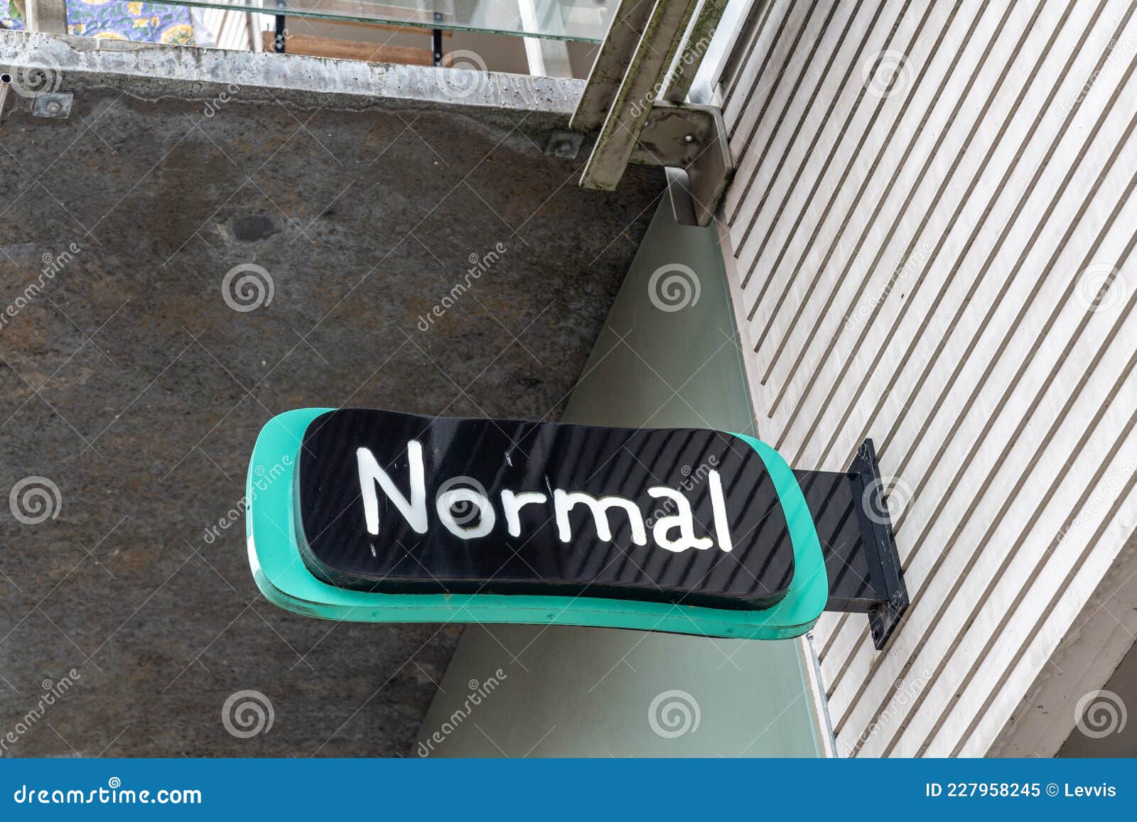 Normal Logo On A Wall Editorial Image | CartoonDealer.com #247297994