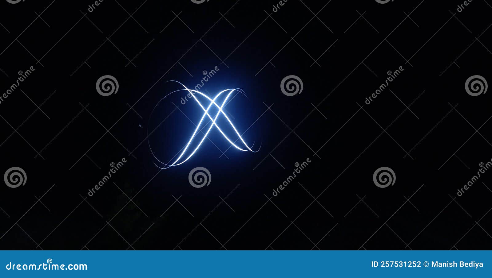 A Logo Written by Using Blue Colour Light in Night Light Painting Stock ...