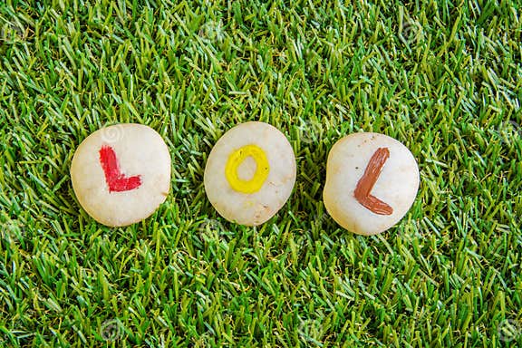 Lol Paint on Stone , on the Grass Stock Photo - Image of vacation ...