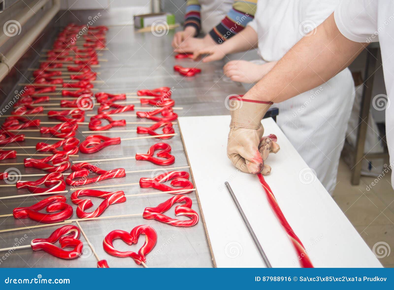Lollipop Making from Melted Sugar in Traditional Candy Workshop Stock ...