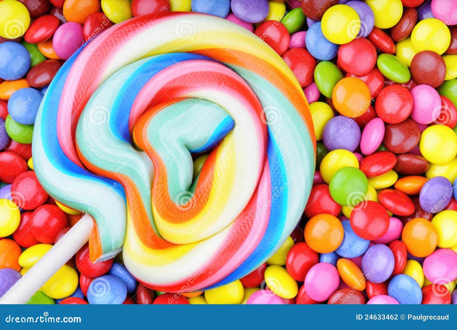 Lollipop and Multicolored Smarties Stock Photo - Image of blue, lick ...