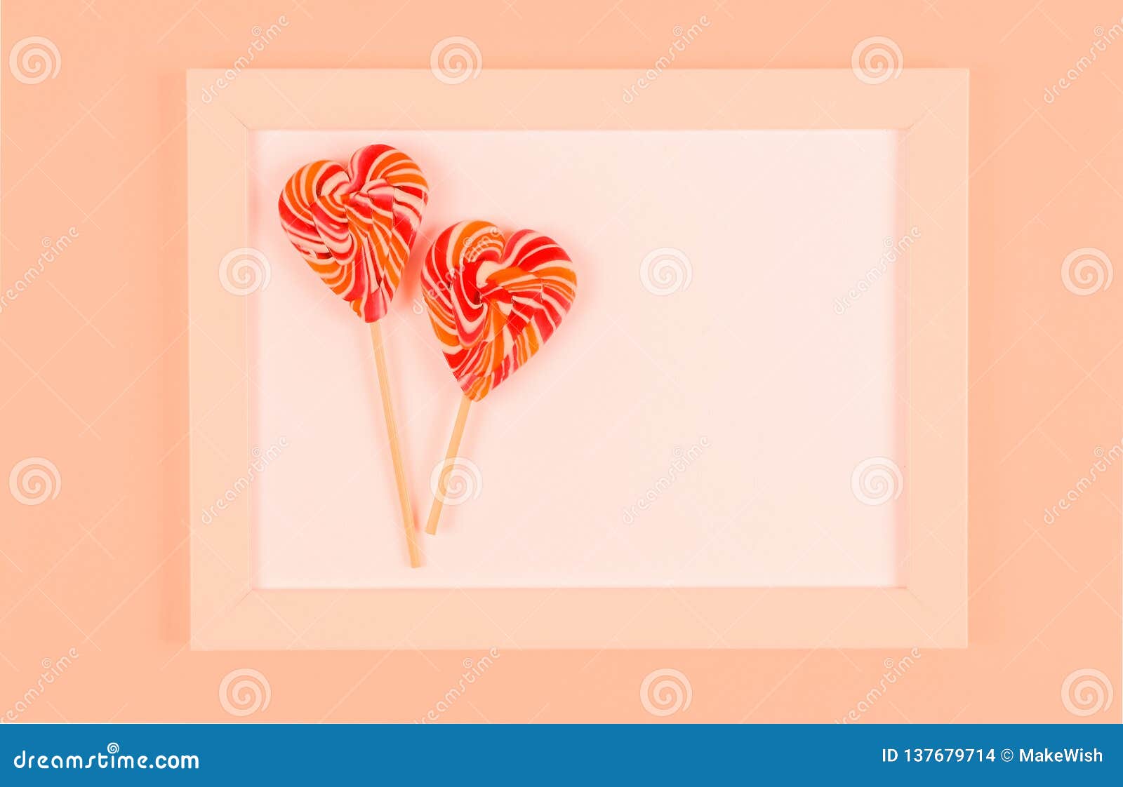 Lollipop in a Pink Frame on a Pink Background Stock Photo - Image of ...
