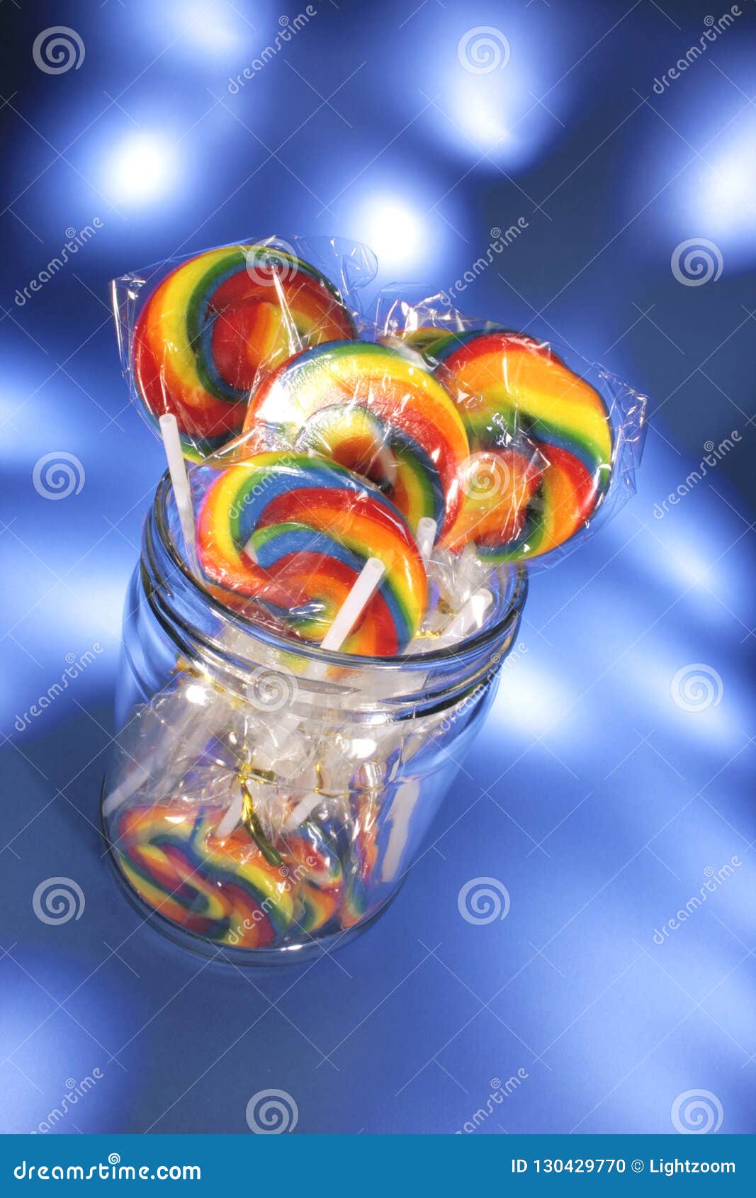 Lollipops in Glass Jar stock photo. Image of junk, lollipops - 130429770