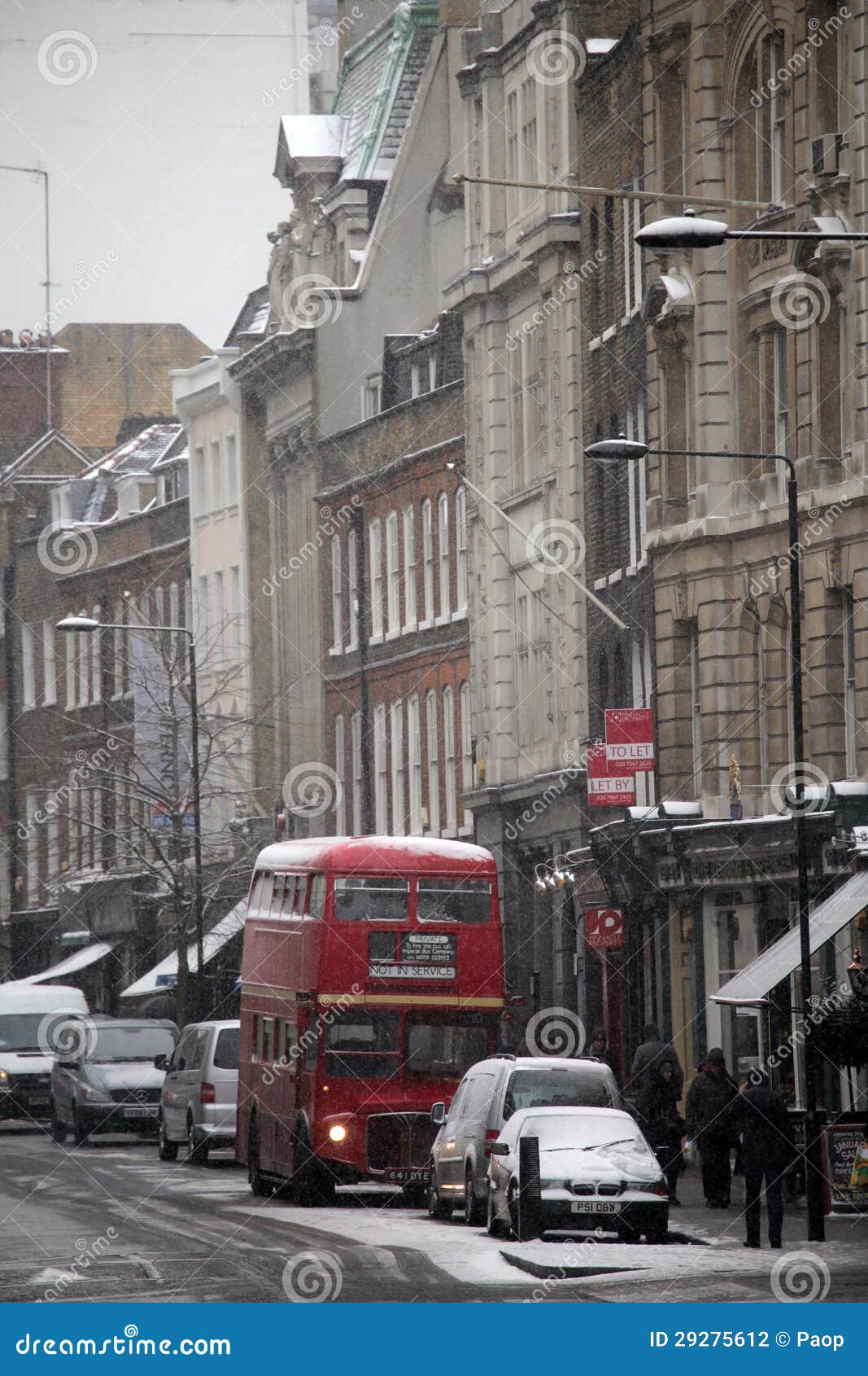 London bus in the snow editorial photography. Image of england - 29275612