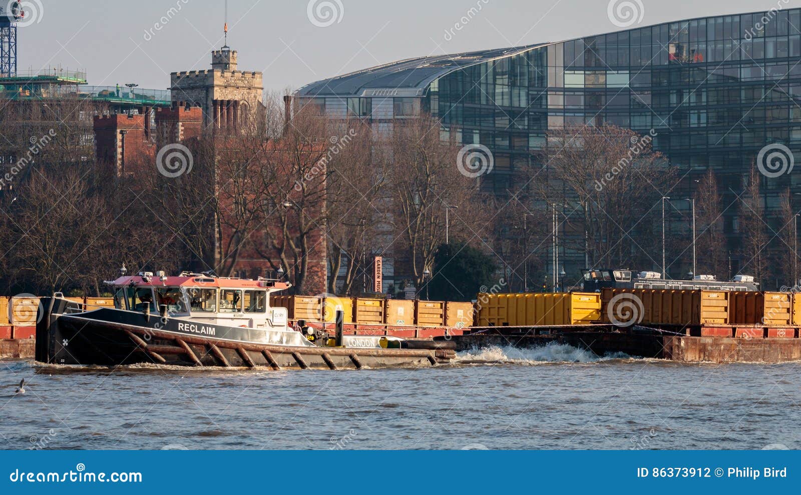 LONDON/UK - FEBRUARY 13 : Reclaim Pulling Containers Down the Ri ...