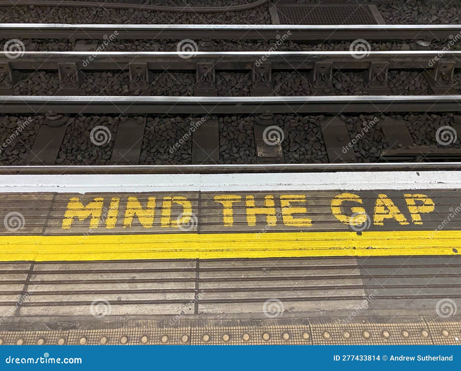 Mind the Gap Painted in Yellow on a London Underground Platform. London ...