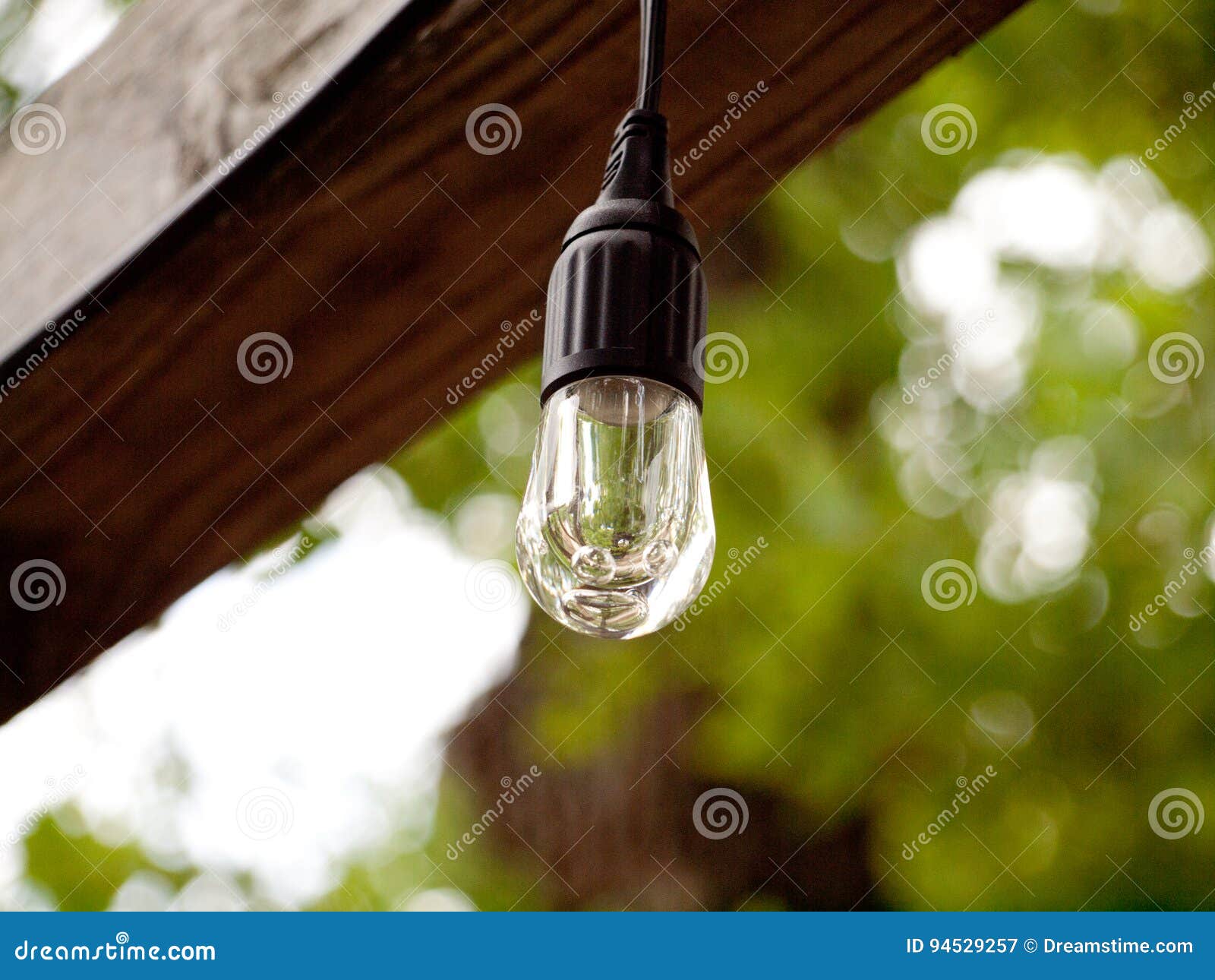 The Lone Bulb Hangs Waiting for the Night Stock Image - Image of hangs ... The Lone Bulb Hangs Waiting for the Night Stock Image - Image of hangs ...