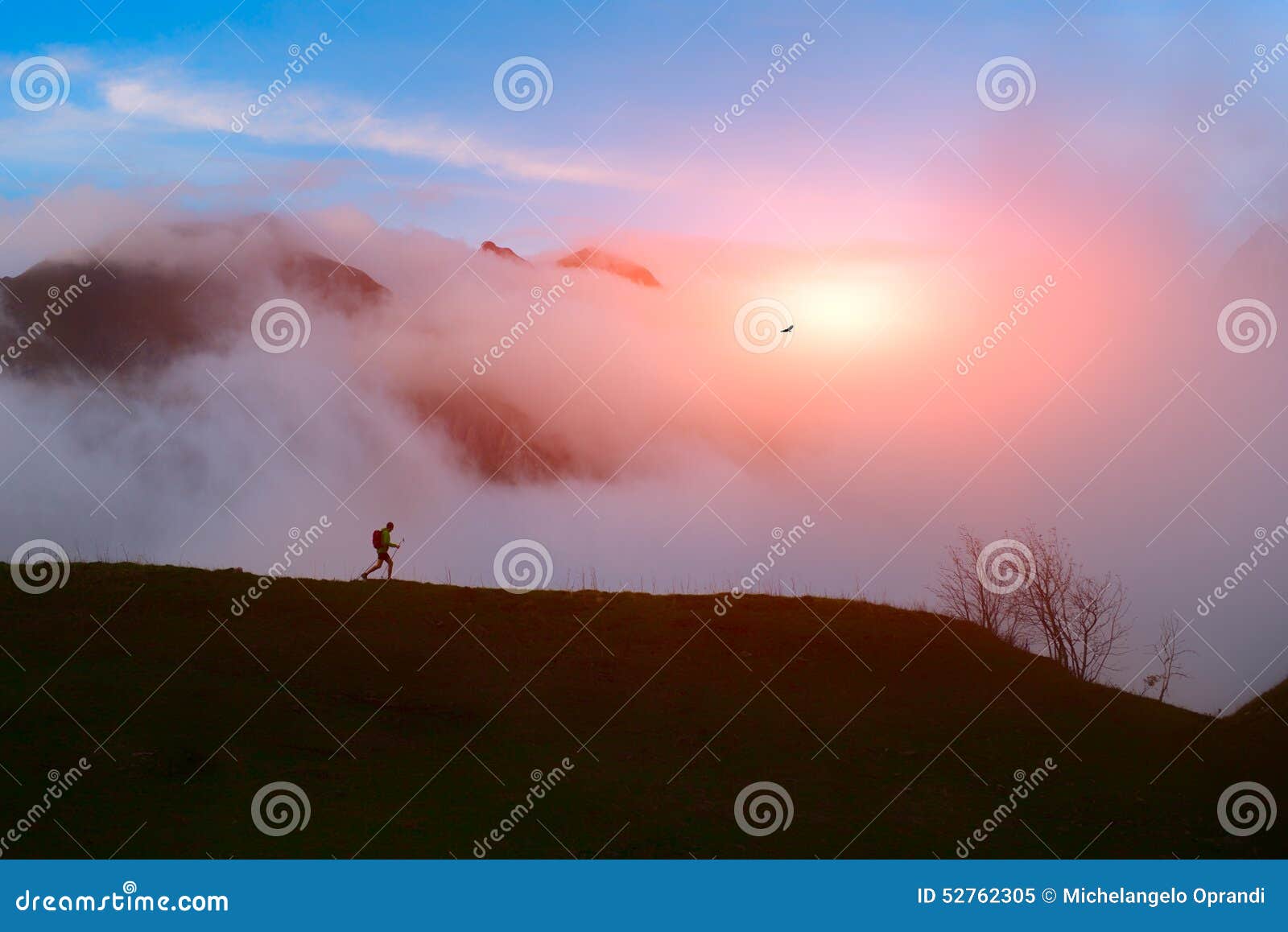 Lone Hiker in the Mountains at Sunset Stock Image - Image of hike ...
