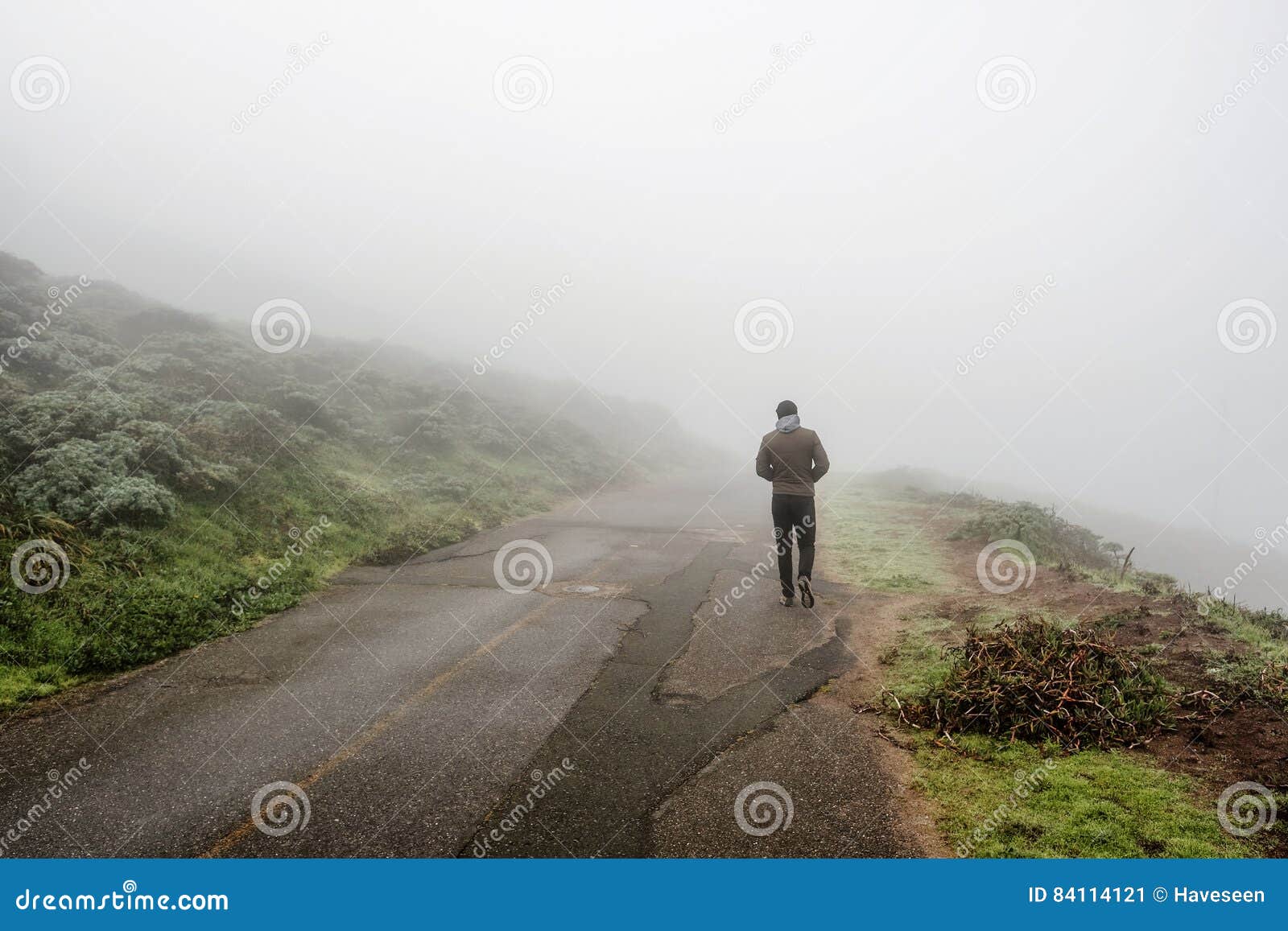 Lone Man Walking through the White Fog Stock Image - Image of lone ...