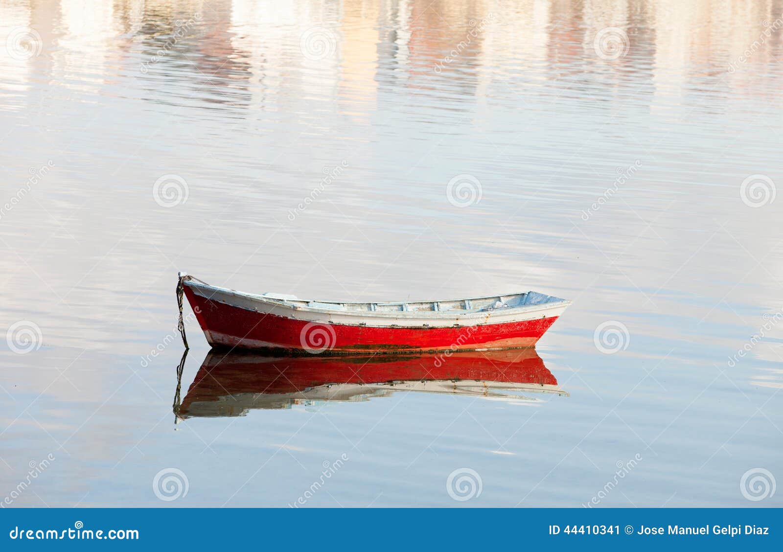 Lone red boat floating stock image. Image of beach, nature - 44410341