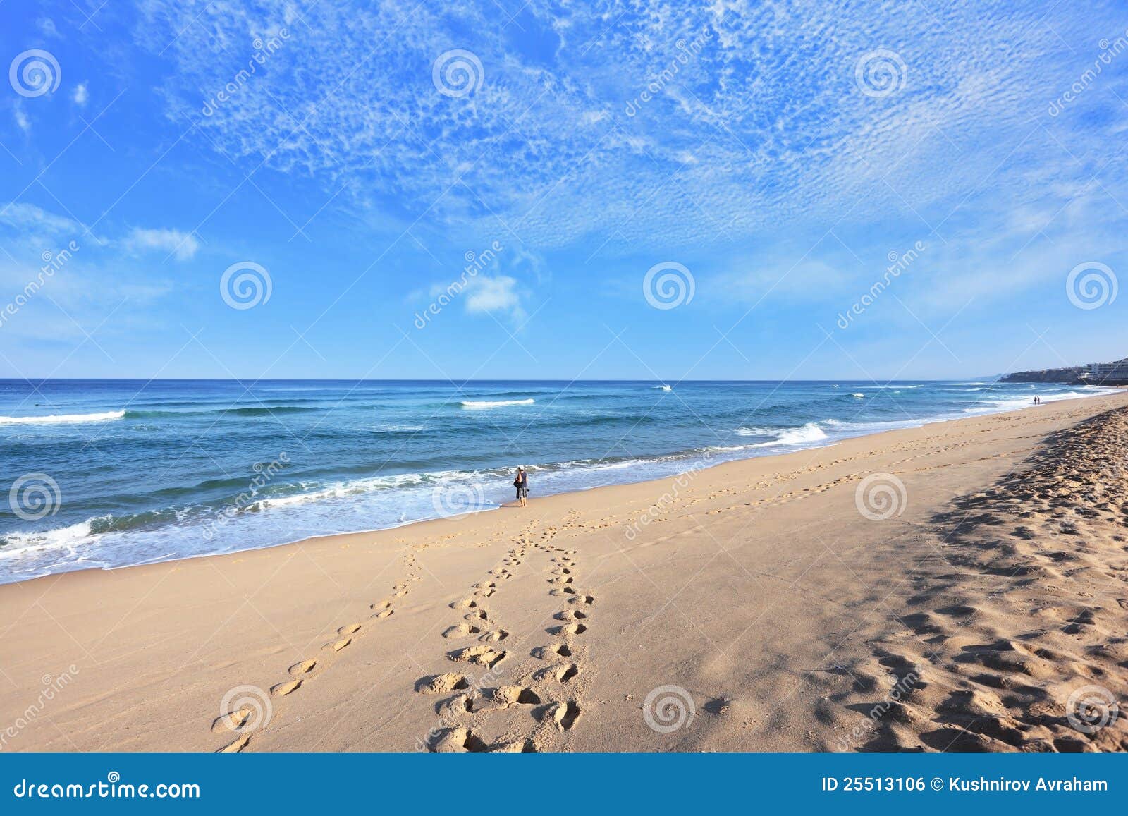 A lone tourist on a beach stock photo. Image of beautiful - 25513106