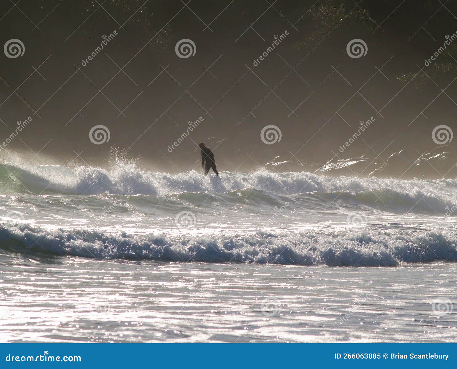 Lone Unrecognizable Surfer on Top of Wave Stock Image - Image of ...