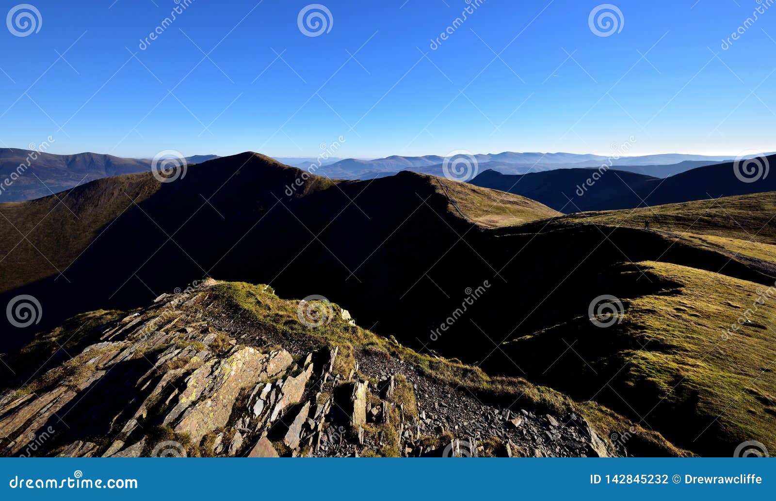Lone Walker on Hobcarton Crags Stock Photo - Image of autumn, hobcarton ...
