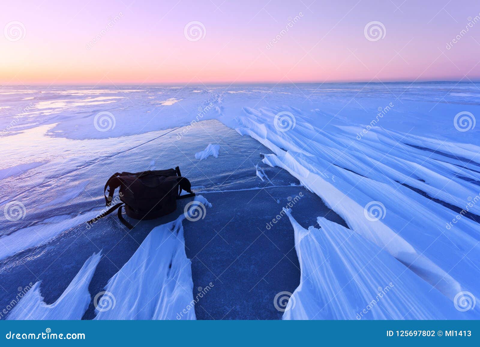 Lonely Backpack Lying on Ice Stock Photo - Image of northern, beautiful ...