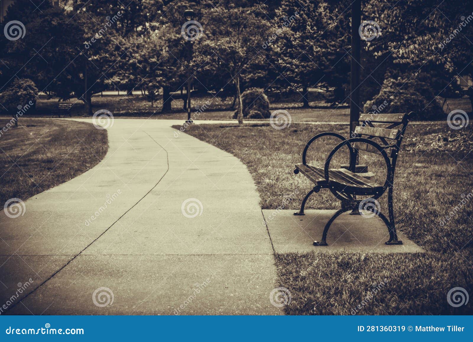 A Lonely Bench Along a Path Stock Image - Image of park, bench: 281360319