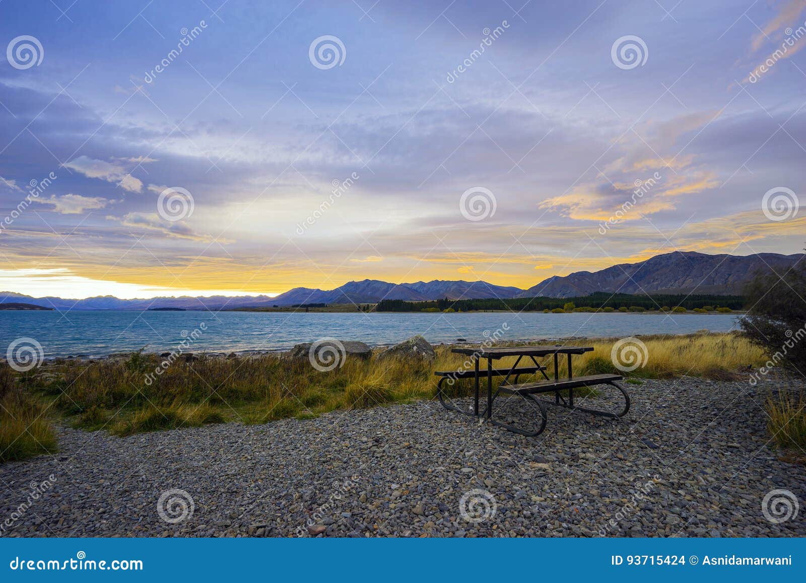 Lonely Bench with Beautiful Sunset Landscape at Background. Stock Photo ...