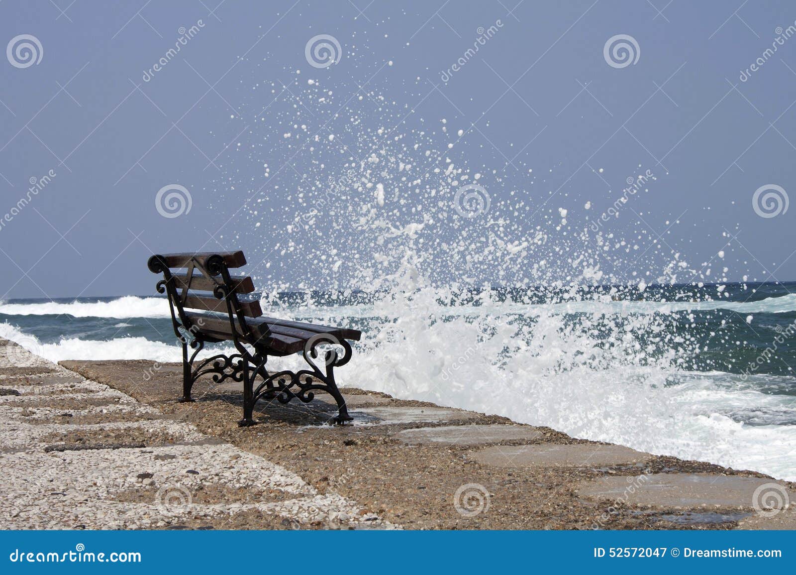 A lonely bench by the sea stock image. Image of outdors - 52572047