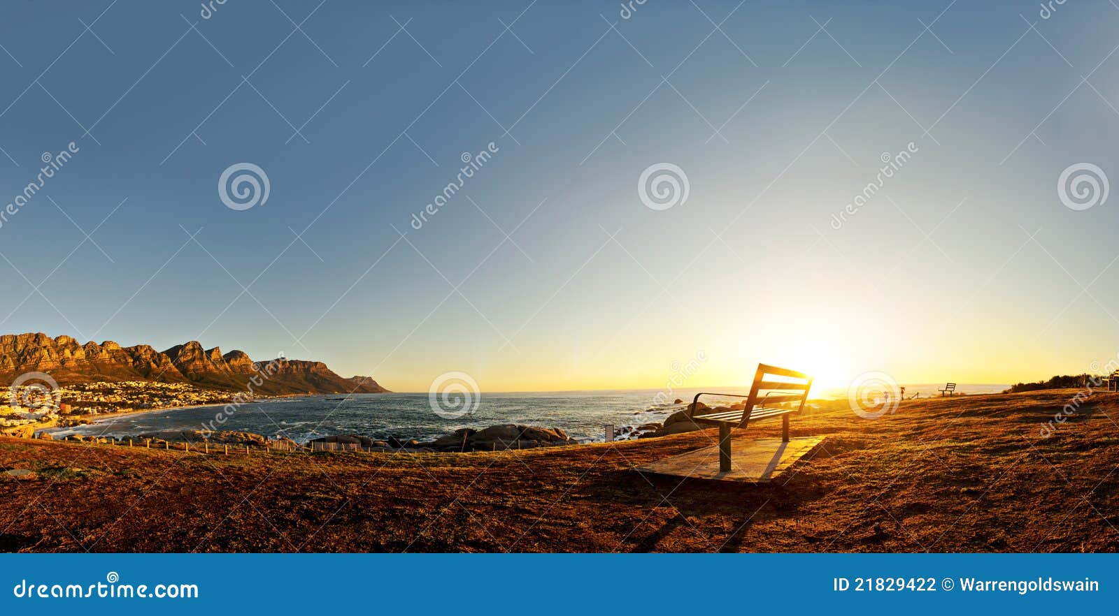 Lonely bench at sunset stock photo. Image of landscape - 21829422