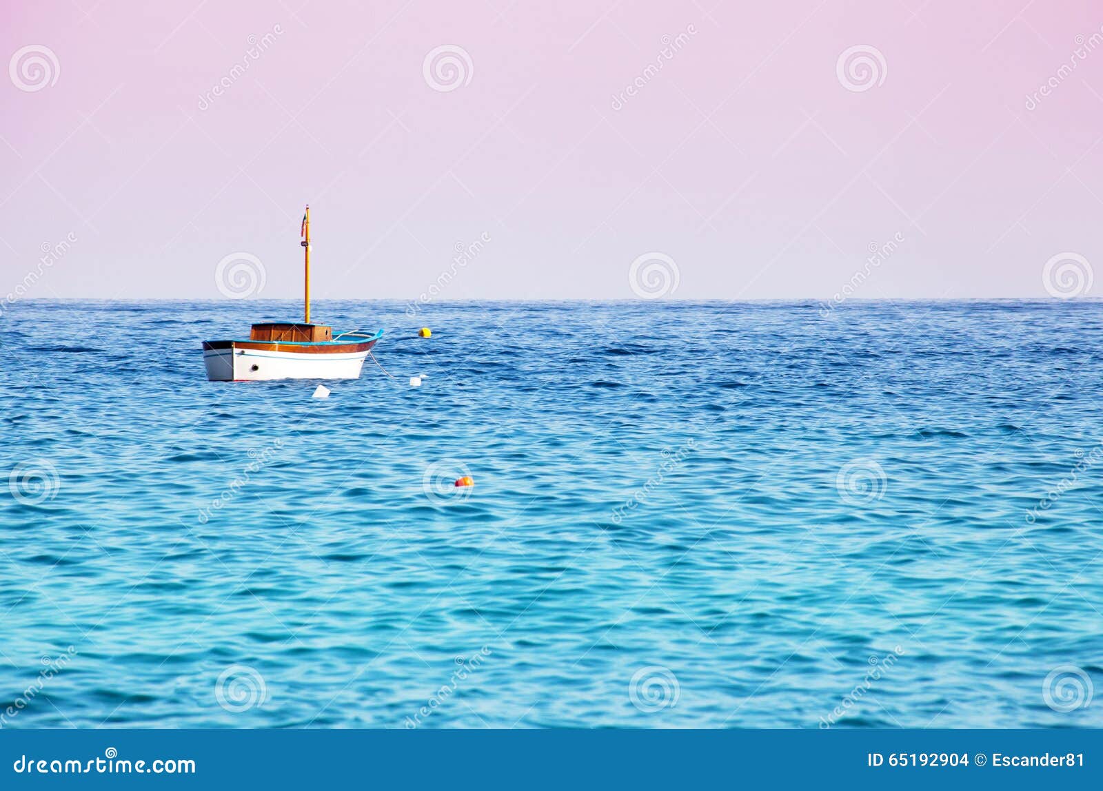 Lonely boat in the sea stock photo. Image of reflection - 65192904