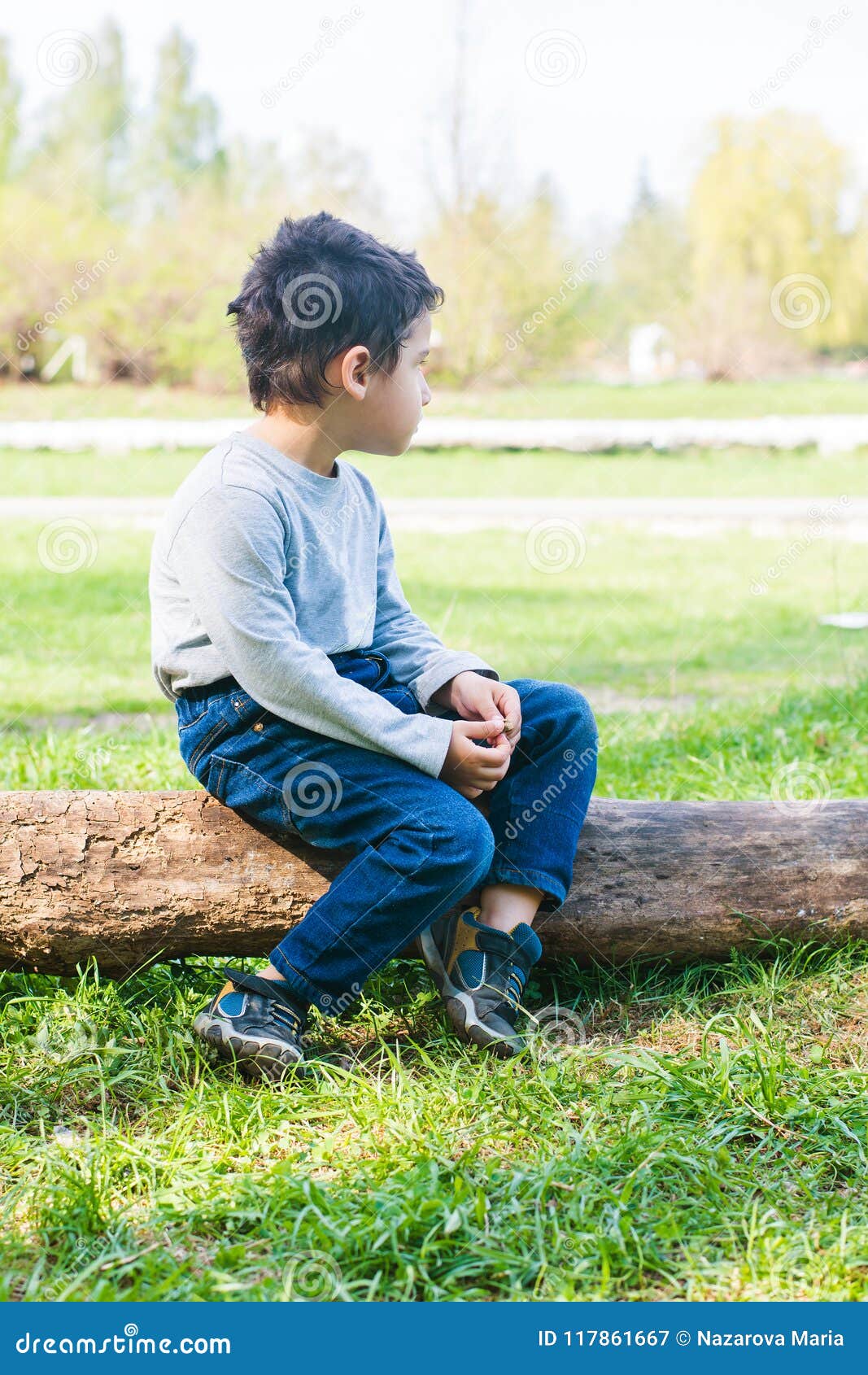 Lonely Boy Sitting on a Log Stock Image - Image of rural, failure ...