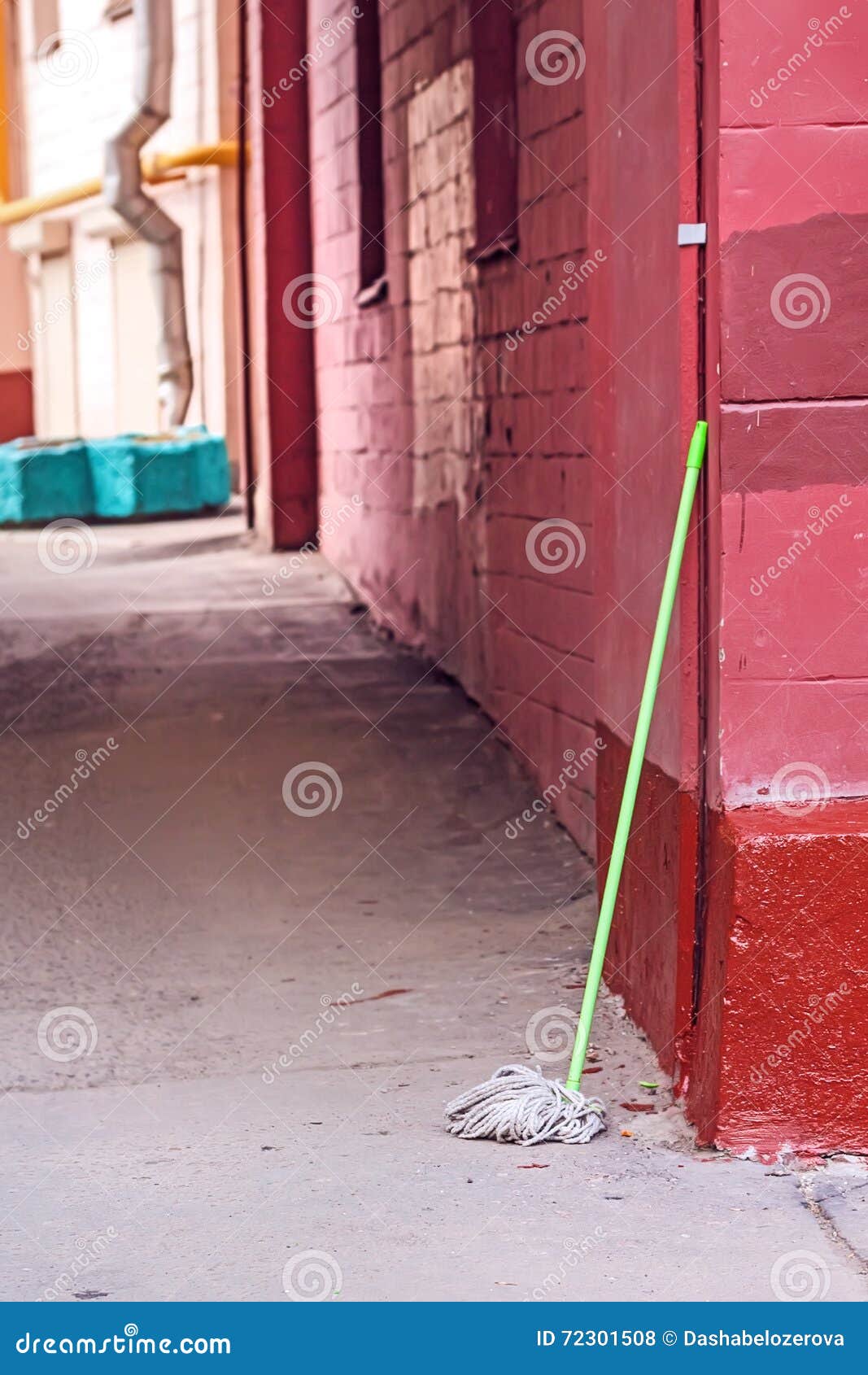 Lonely broom against gate stock photo. Image of house - 72301508