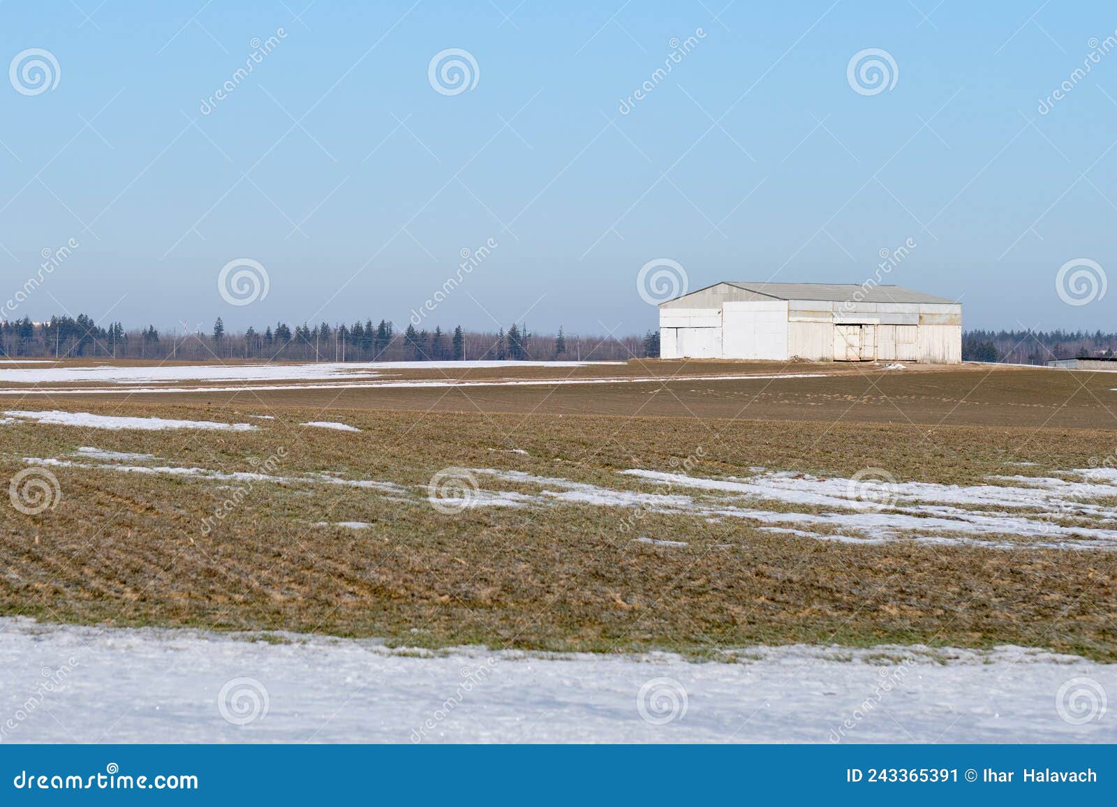 A Lonely Building in a Field. Land Development Concept Stock Image ...
