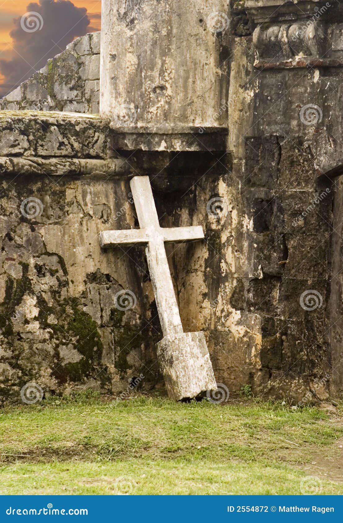 Lonely Cross Against Wall stock photo. Image of catholic - 2554872
